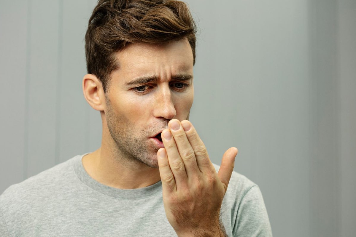 What Causes Bad Breath: Unveiling the Culprits Behind Halitosis